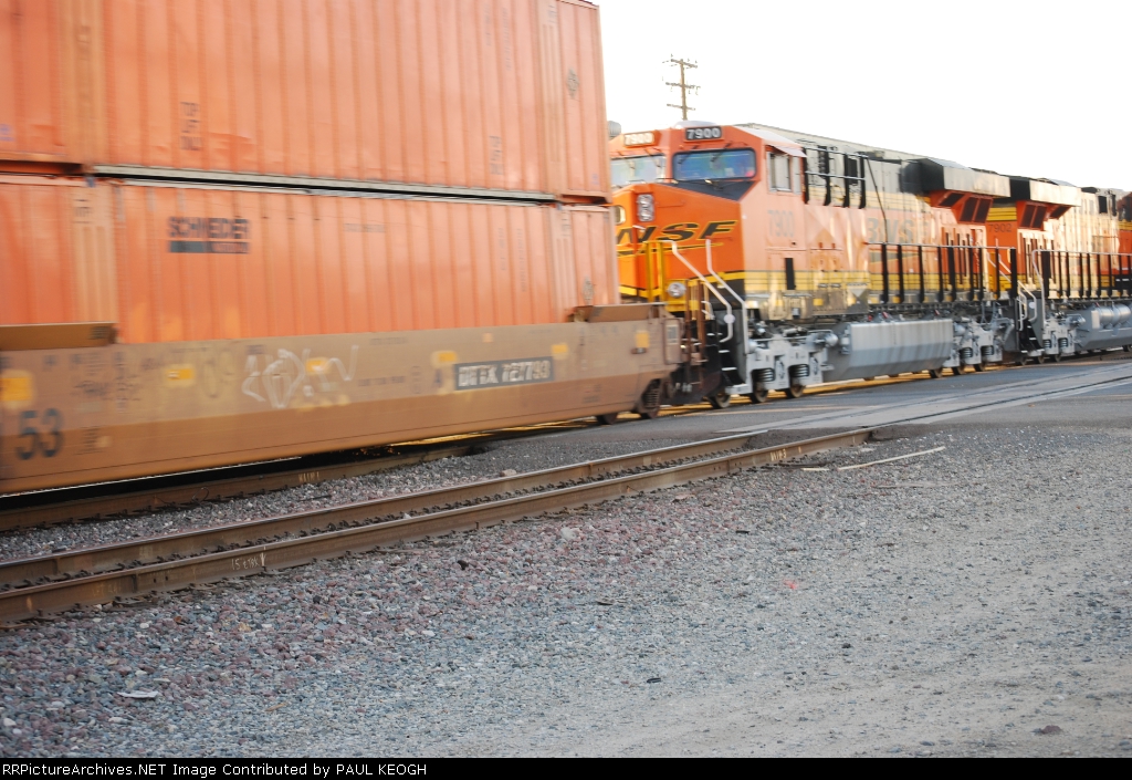 BNSF 7900 and BNSF 7902 roll over the West Valley Blvd crossing as they make their way West as ...